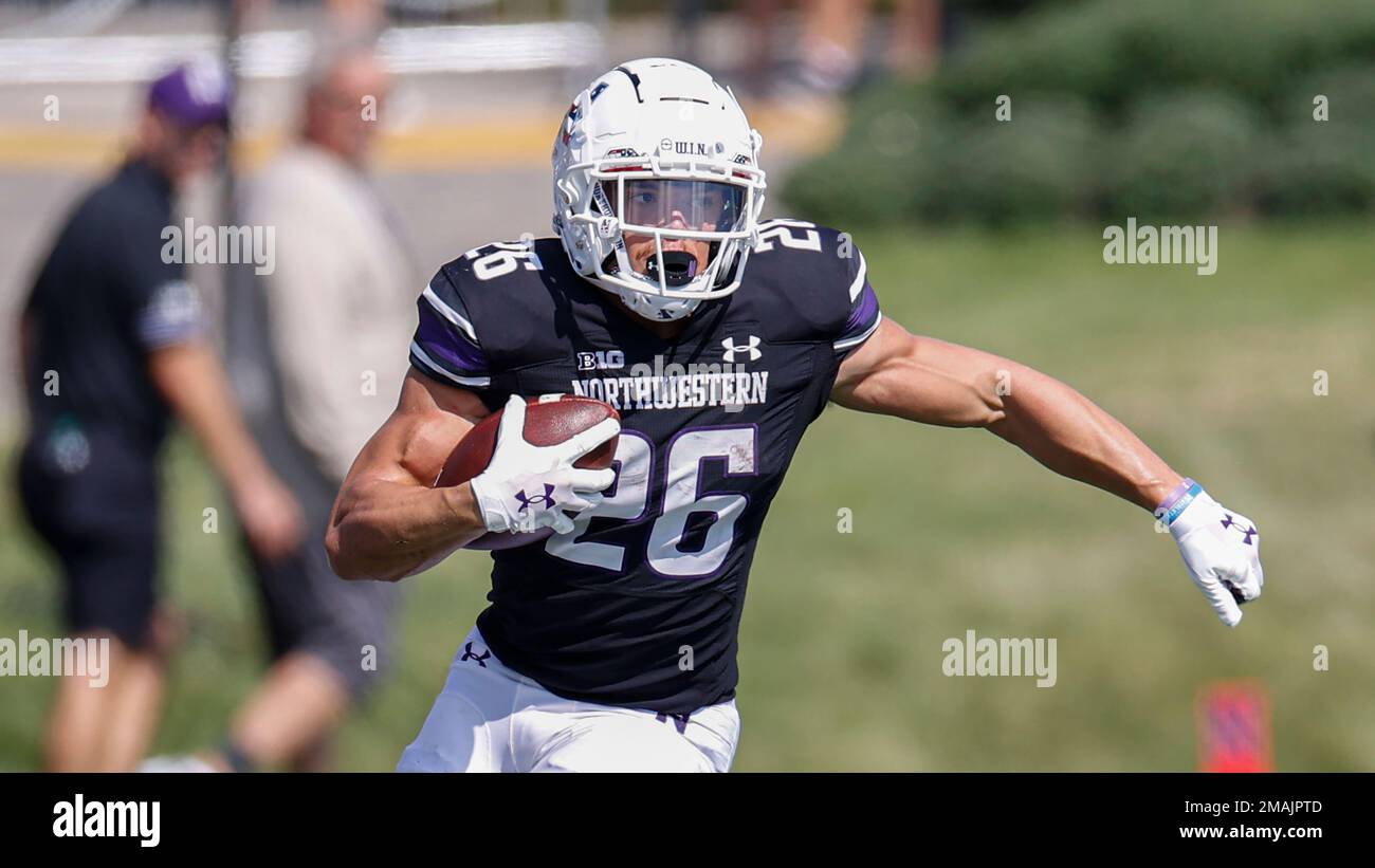 Northwestern running back Evan Hull (26) runs with the ball against ...
