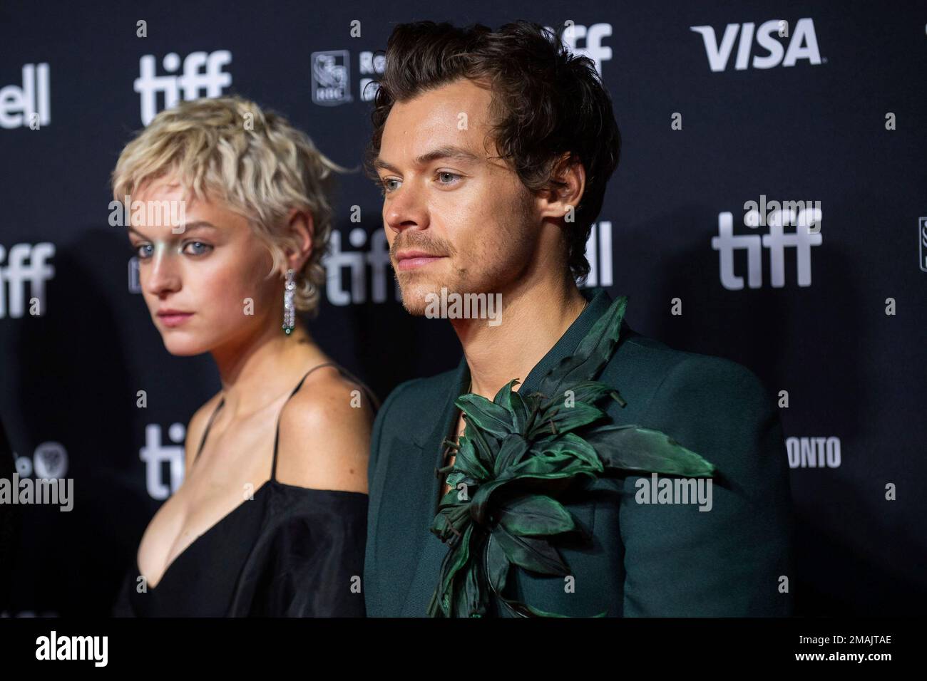 Emma Corrin and Harry Styles attend the TIFF Tribute Awards at Fairmont ...
