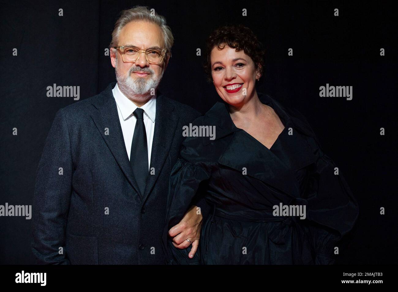 Sam Mendes, left, and Olivia Colman attend the TIFF Tribute Awards at ...