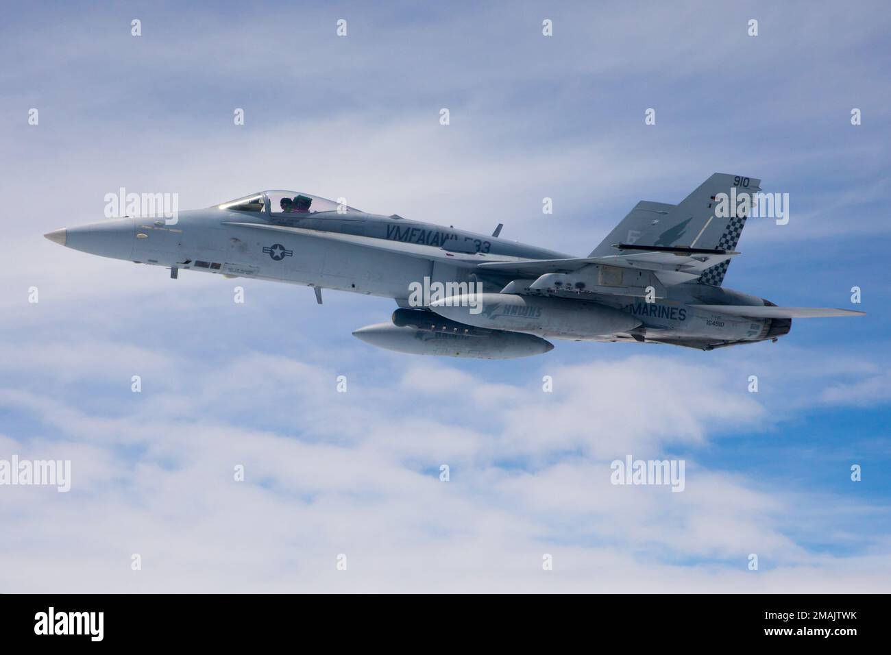 A U.S. Marine Corps F/A-18C Hornet aircraft with Marine All Weather ...