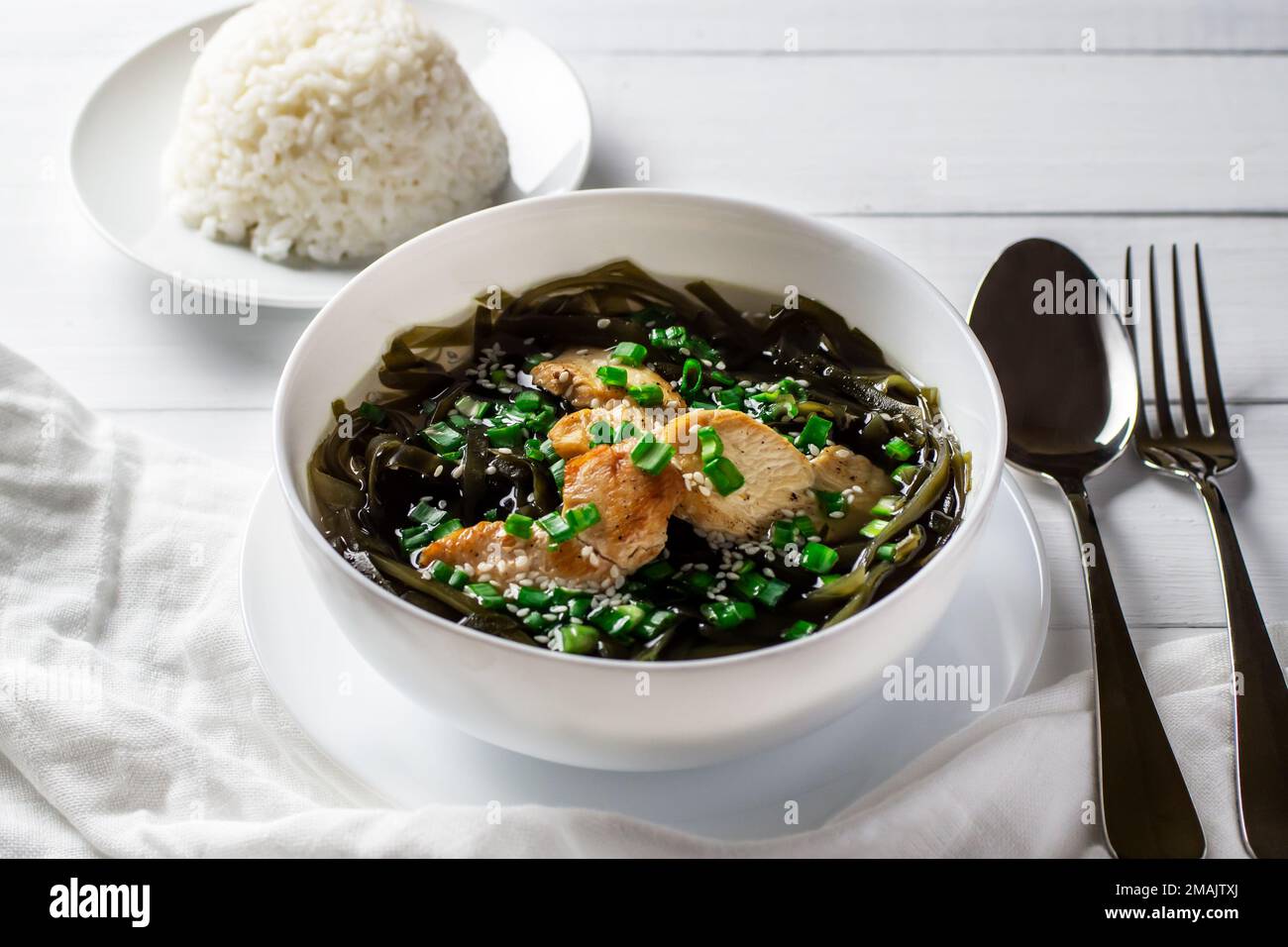Korean seaweed soup with meat in white bowl and boiled rice. Birthday ...