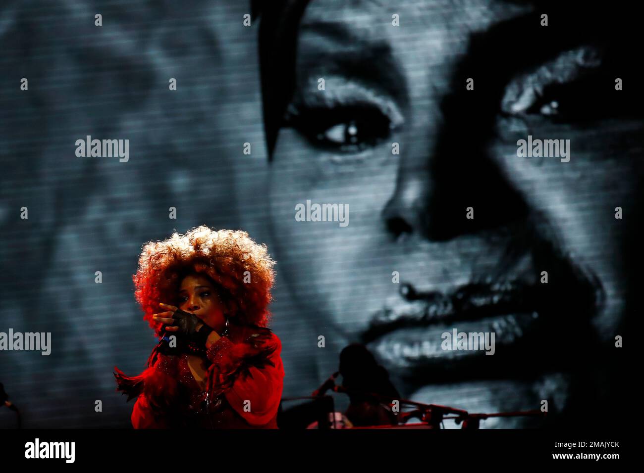 Macy Gray performs in front of a projection of Brazilian singer Elza ...