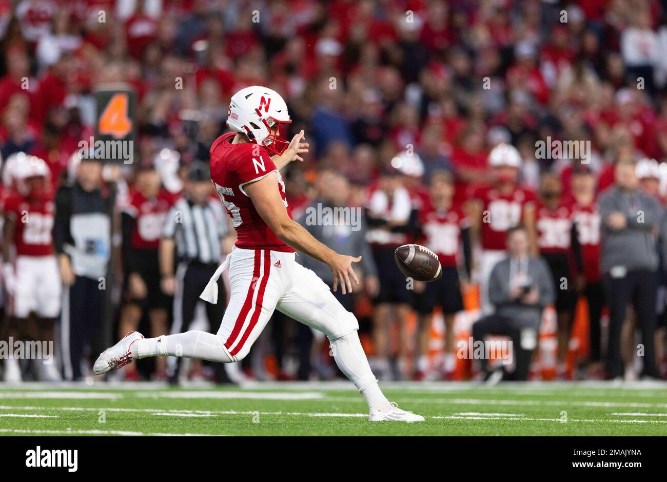 Nebraska's Brian Buschini punts the ball against Georgia Southern ...