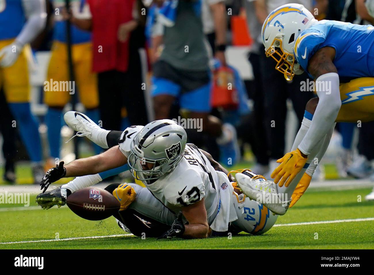 Las Vegas Raiders wide receiver Hunter Renfrow (13) reaches to recover ...