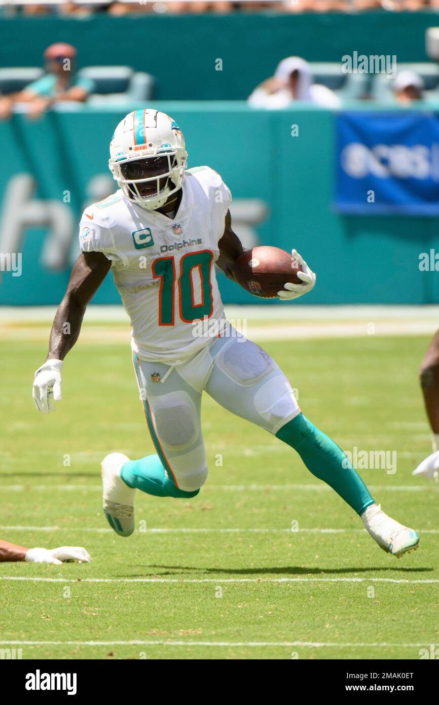 Miami Dolphins wide receiver Tyreek Hill (10) runs with the ball during ...