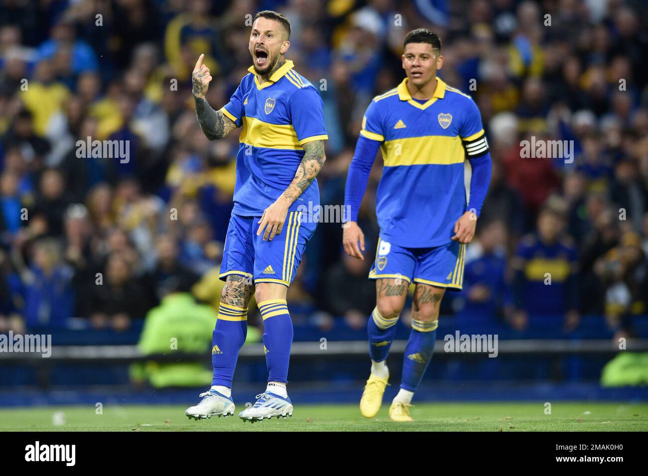 Dario Benedetto, left, of Boca juniors celebrates after scoring his ...