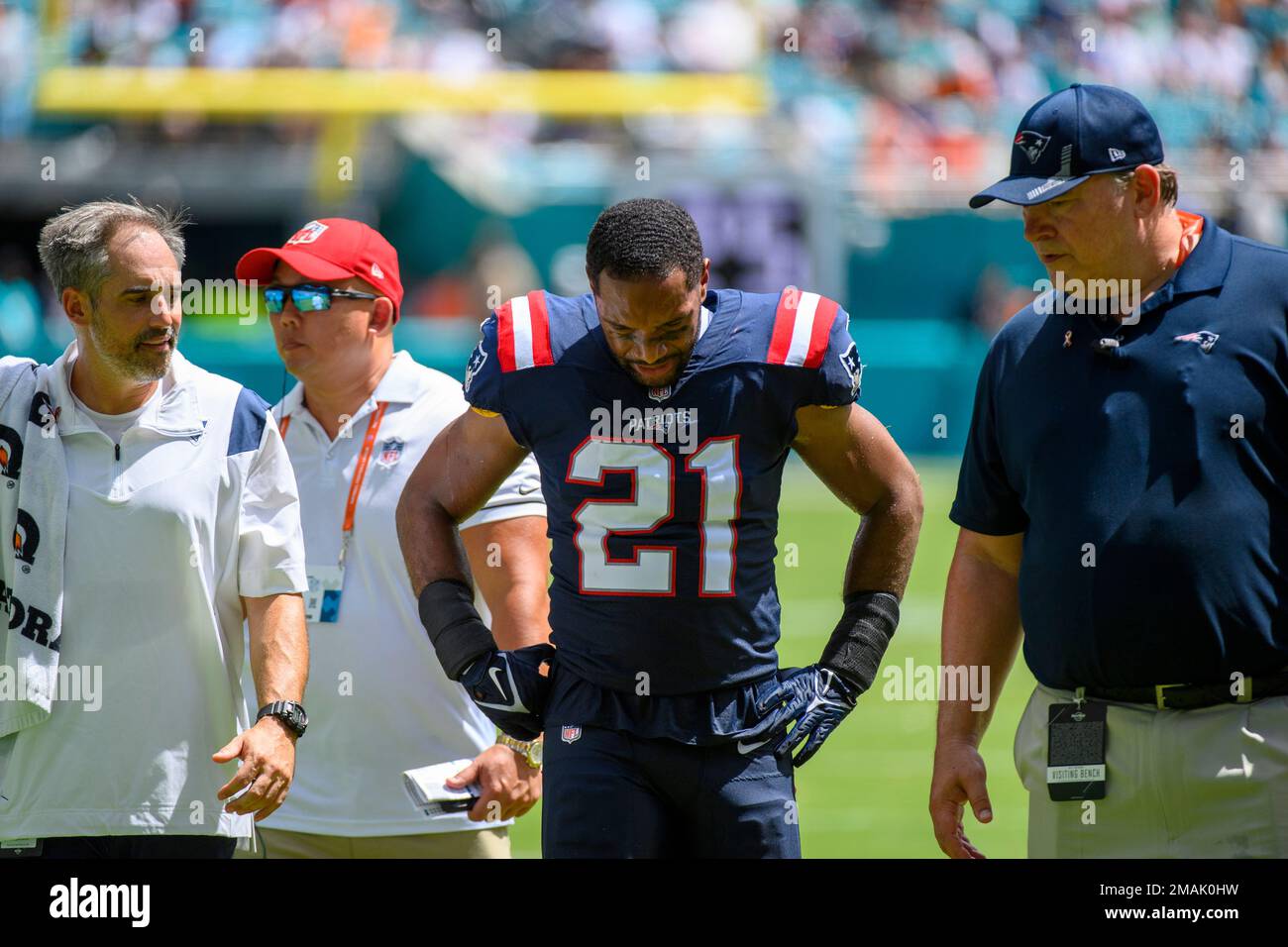New England Patriots defensive back Adrian Phillips (21) walks back to ...
