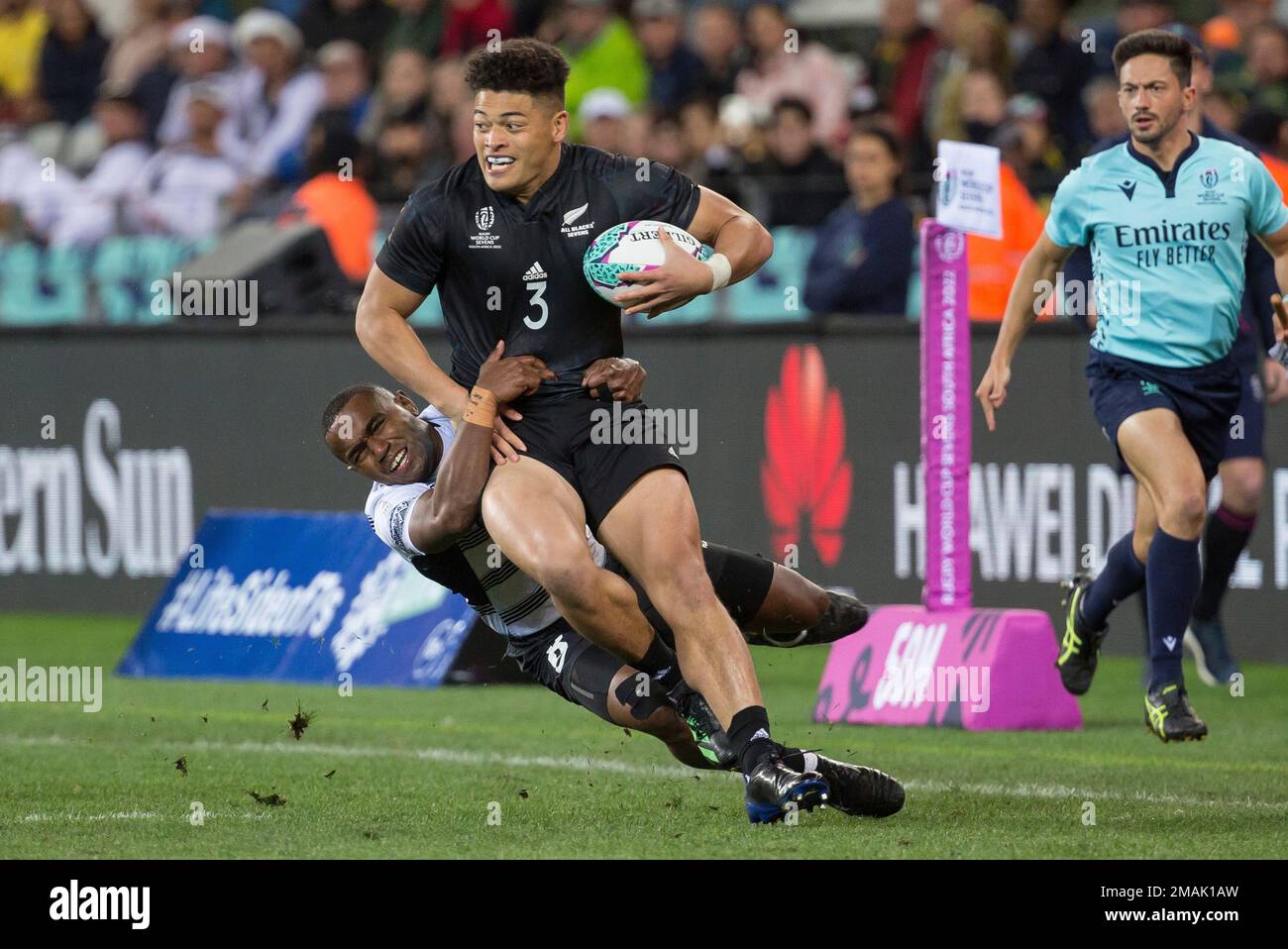 Tone Ng Shiu of New Zealand is tackled by Waisea Nacuqu of Fiji during ...