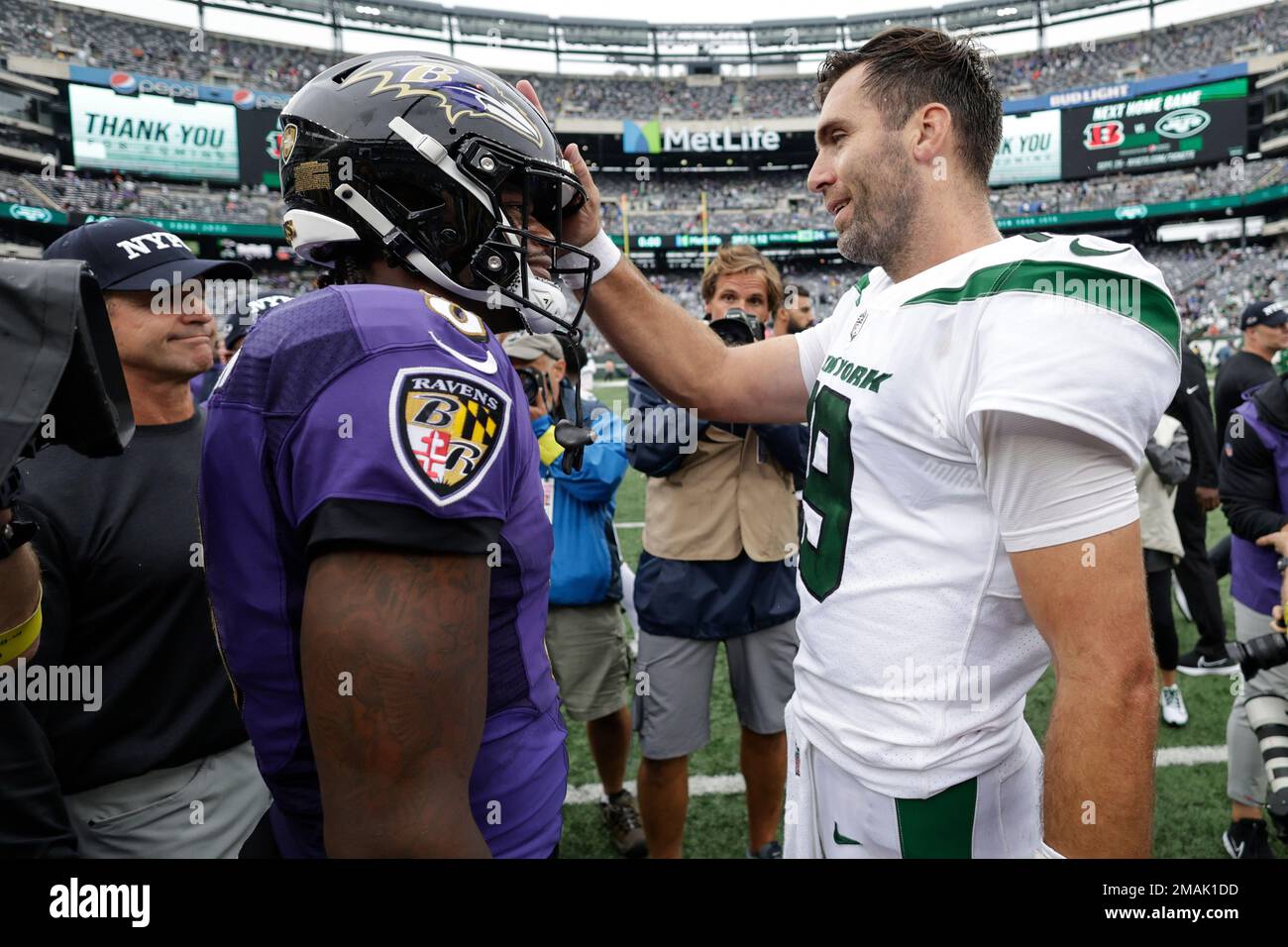 Baltimore Ravens head coach John Harbaugh, left, watches as Ravens ...