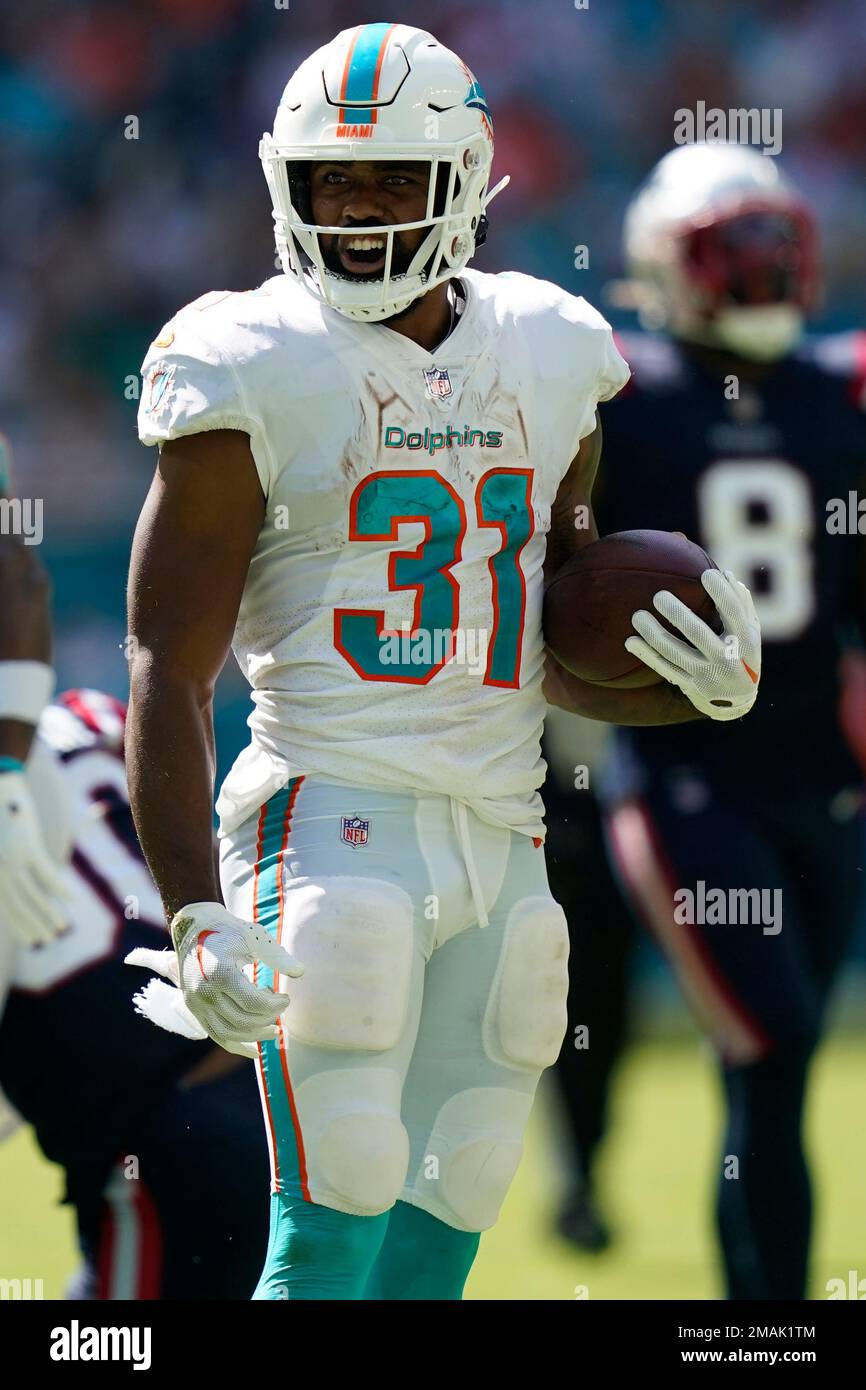 Miami Dolphins running back Raheem Mostert (31) gestures after a play during the second half of ...