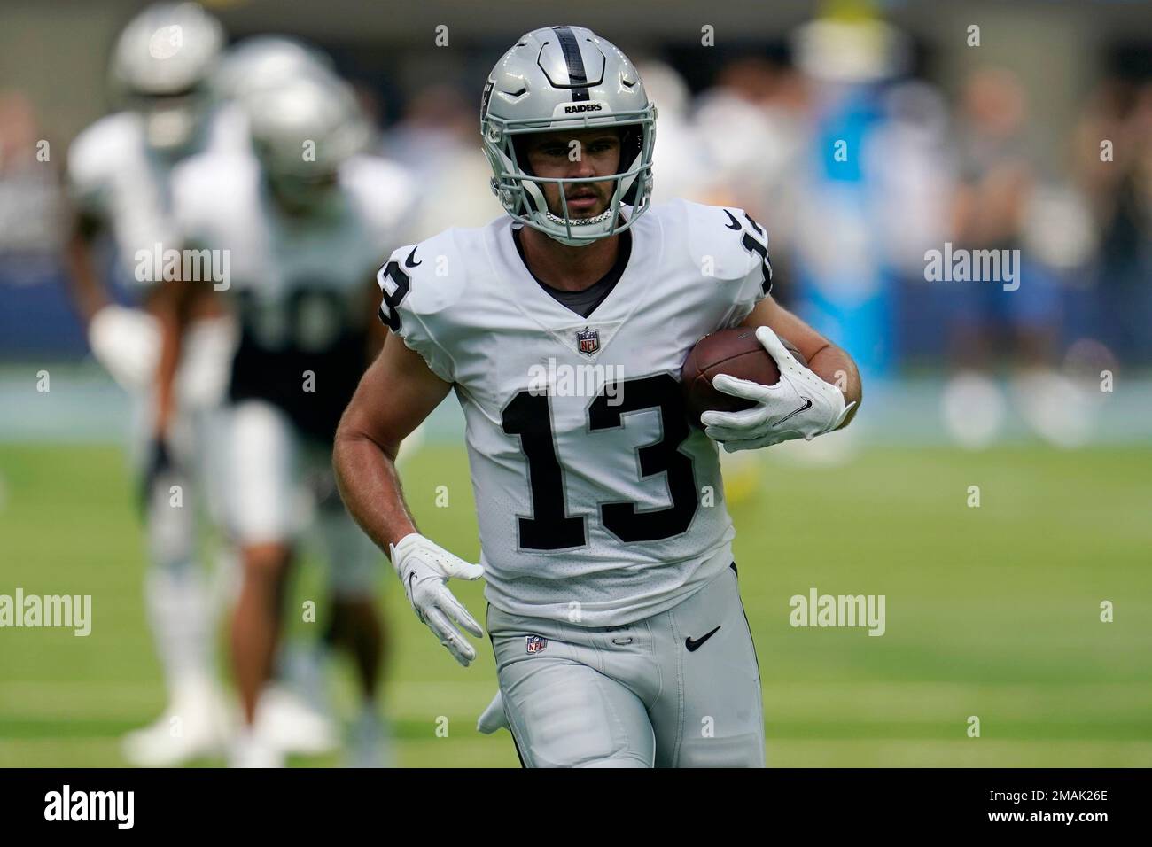 Las Vegas Raiders wide receiver Hunter Renfrow (13) warms up before an ...