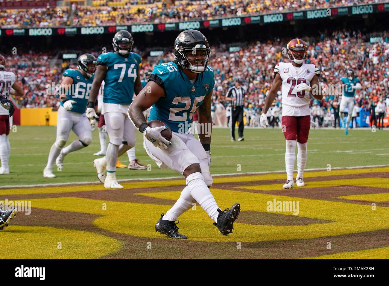 Jacksonville Jaguars running back James Robinson (25) scoring a ...
