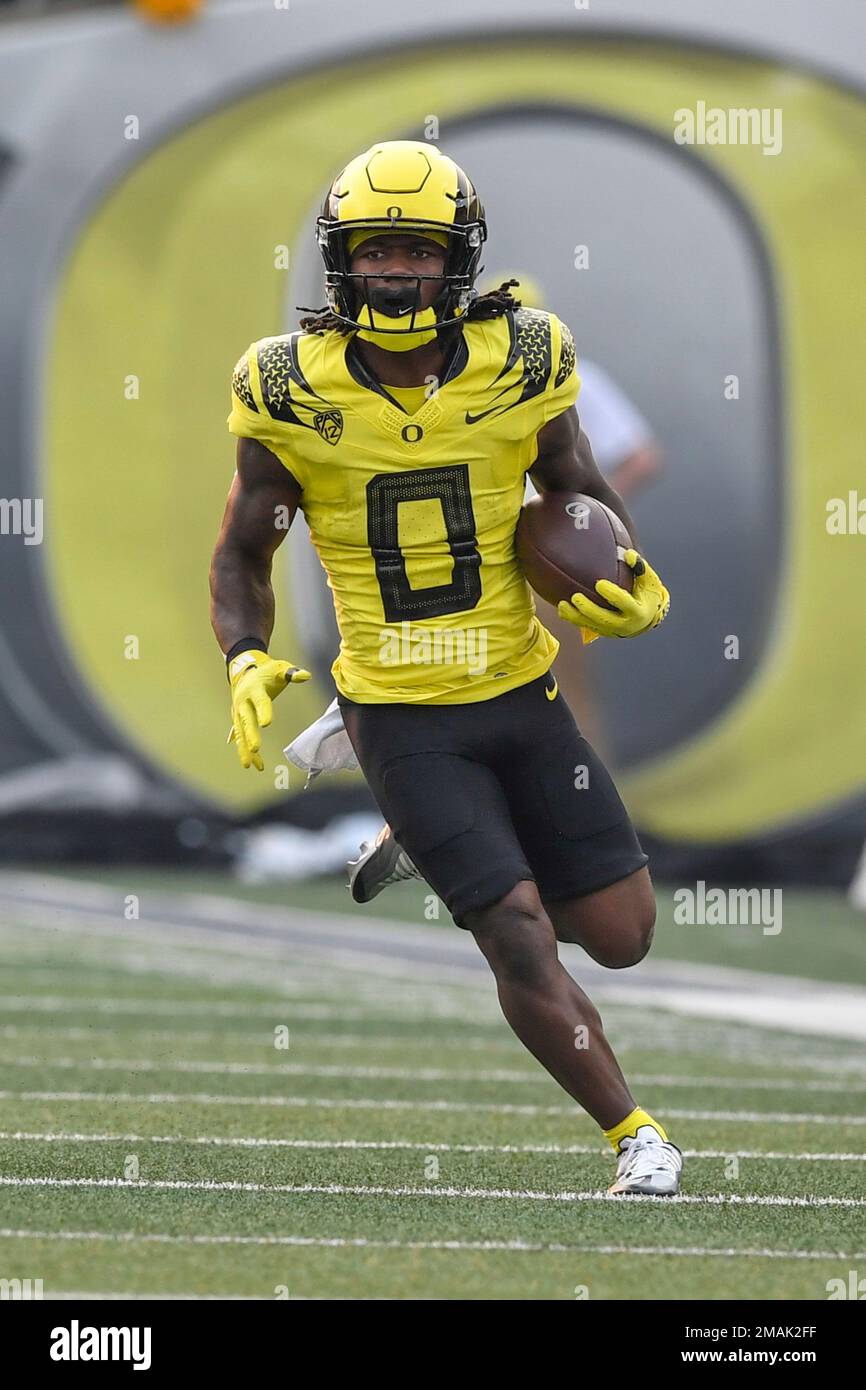 Oregon running back Mar'Keise Irving (0) runs the ball against Eastern ...