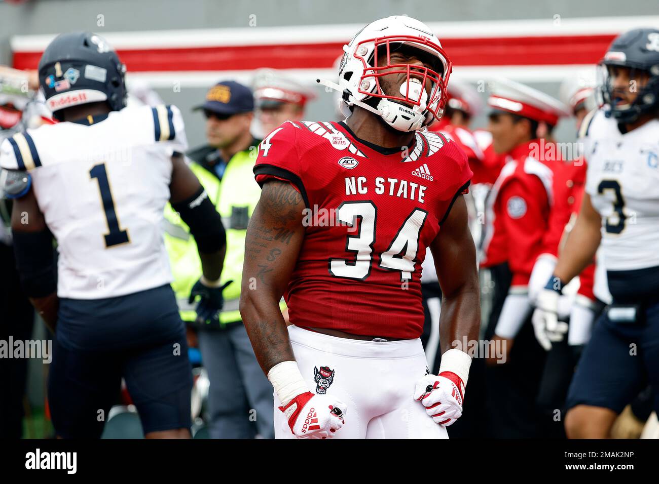 North Carolina State's Delbert Mimms III (34) celebrates a touchdown ...