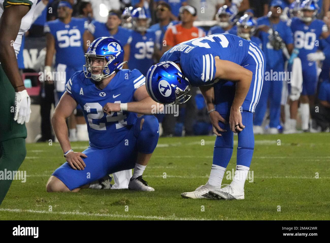 BYU place kicker Jake Oldroyd, right, reacts to his game winner missed ...
