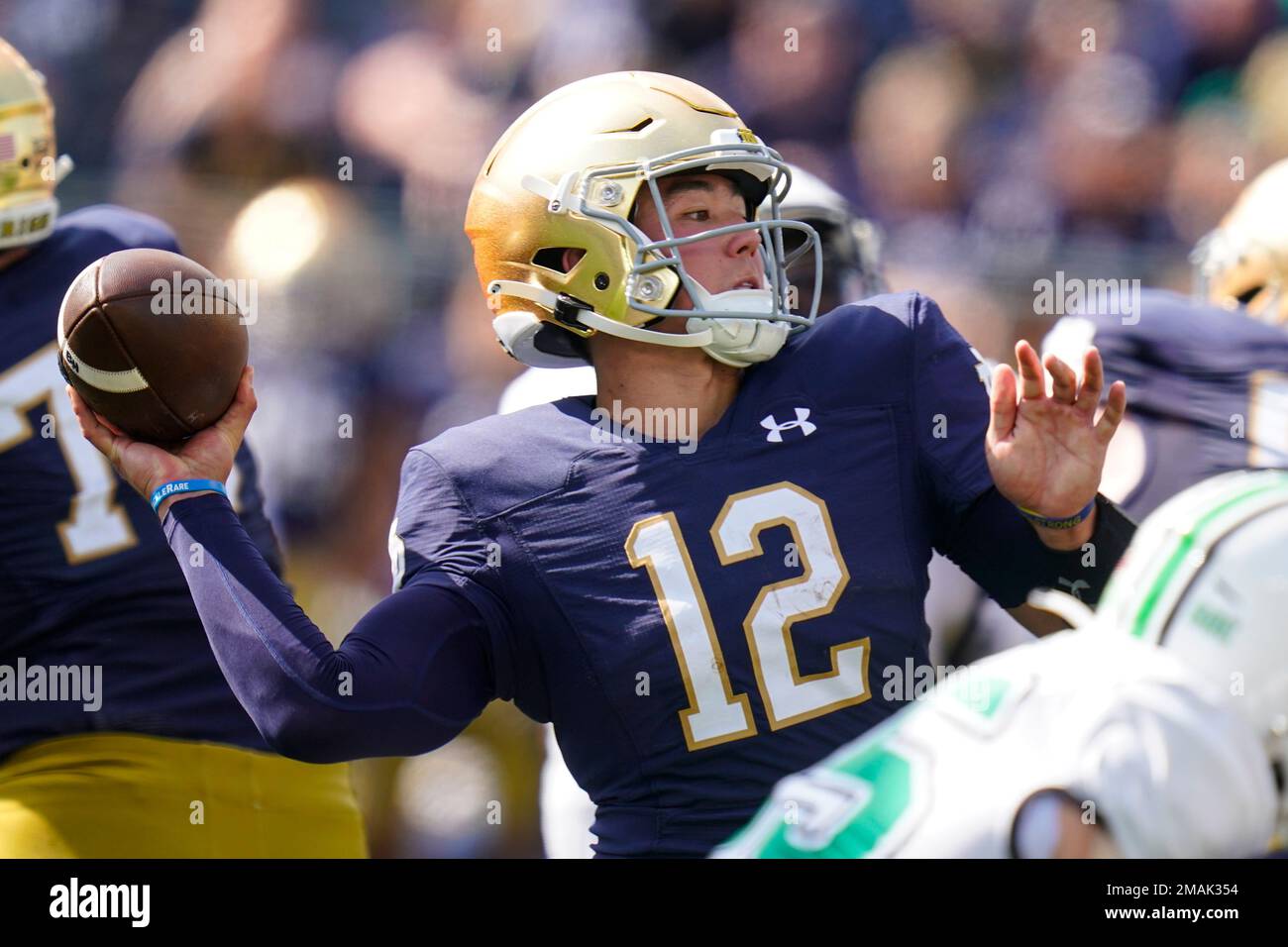 Notre Dame quarterback Tyler Buchner (12) throws against Marshall ...