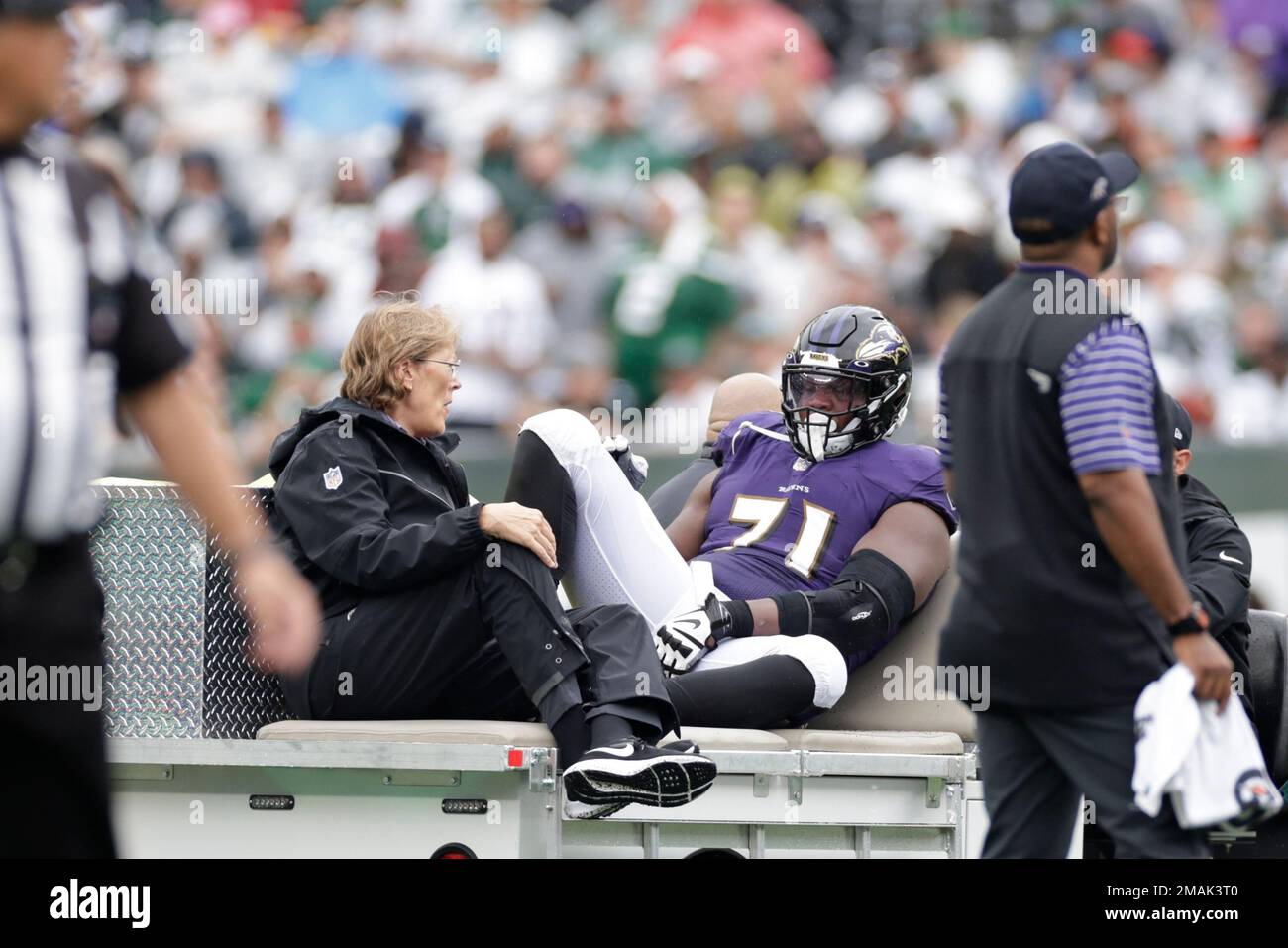 Baltimore Ravens offensive tackle Ja'Wuan James (71) is carted off the ...