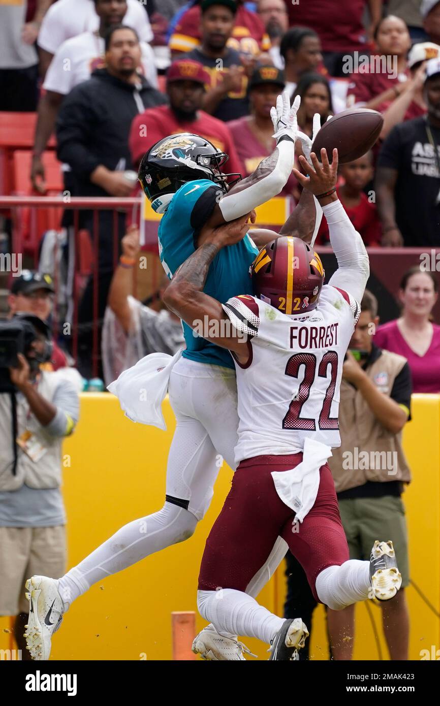 Washington Commanders safety Darrick Forrest (22) breaks up a pass for ... Washington Commanders safety Darrick Forrest (22) breaks up a pass for ...