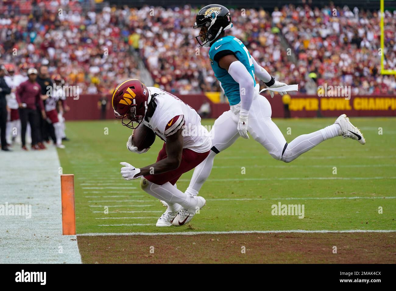 Washington Commanders wide receiver Curtis Samuel (10) scores a ...