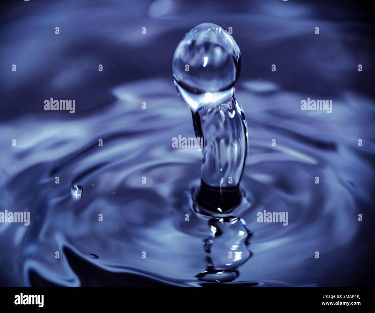 Macro photo of unique shapes formed by splashing water drop Stock Photo ...
