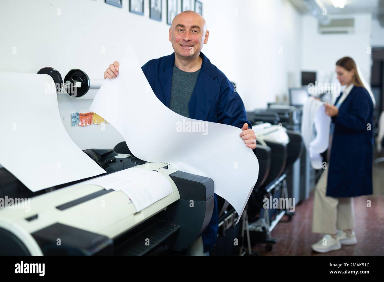 Newspaper publishing office male hi-res stock photography and images ...