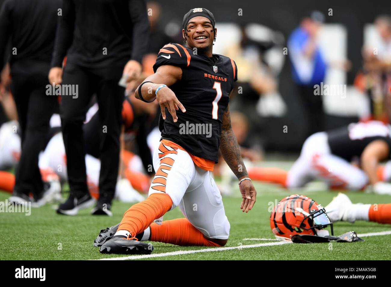 Cincinnati Bengals wide receiver Ja'Marr Chase (1) smiles during warm ...