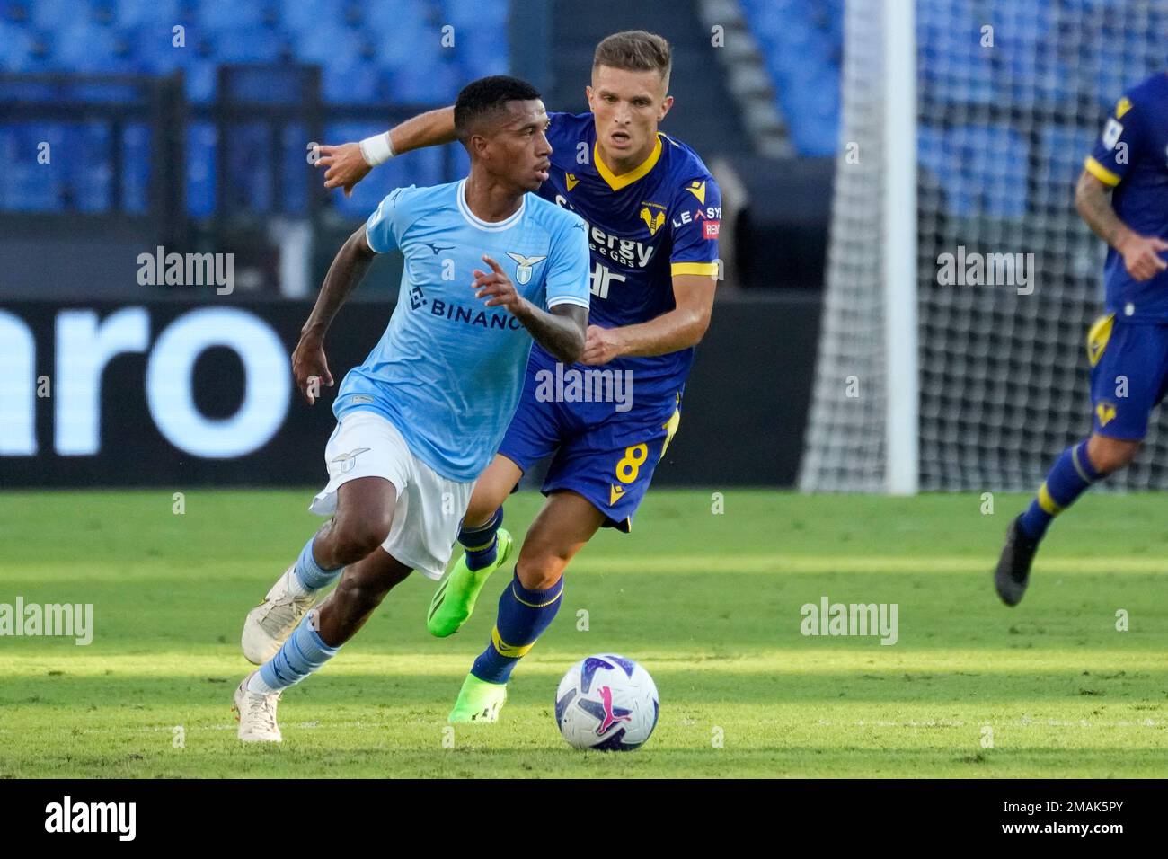 Lazio's Marcos Antonio, left, and Verona's Darko Lazovic fight for the ball during a Serie A ...