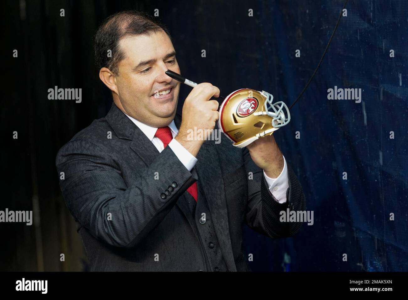 San Francisco 49ers CEO Jed York signs an autograph before an NFL ...