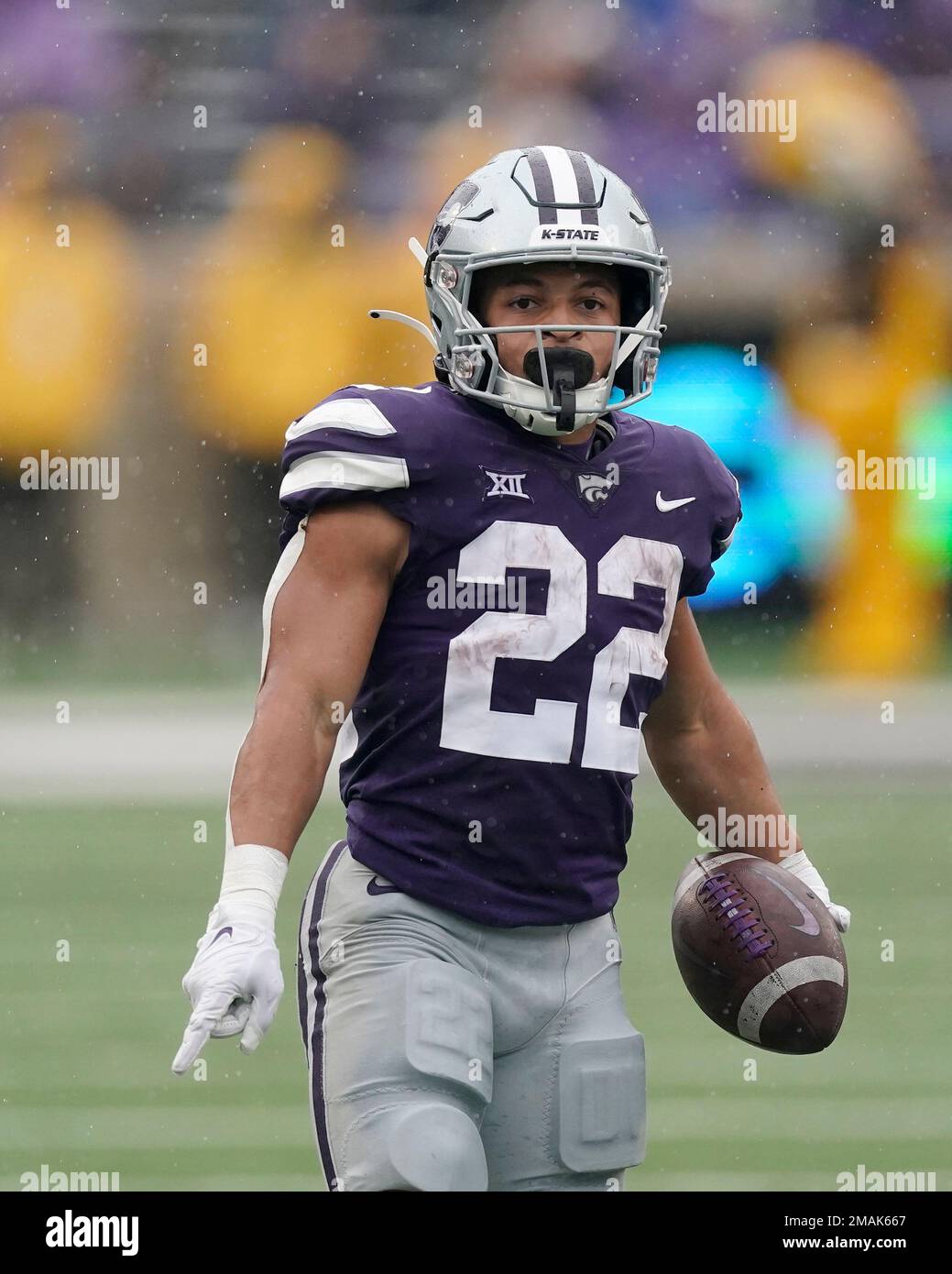 Kansas State running back Deuce Vaughn reacts after running the ball ...