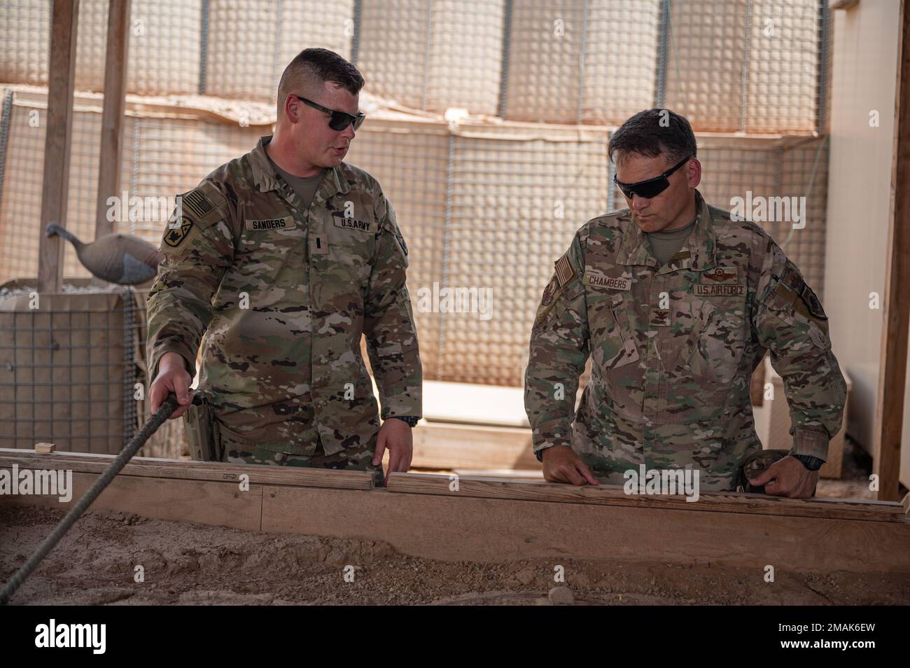 U.S. Army 1st Lt. Timothy Sanders, left, commander of Bravo Company ...