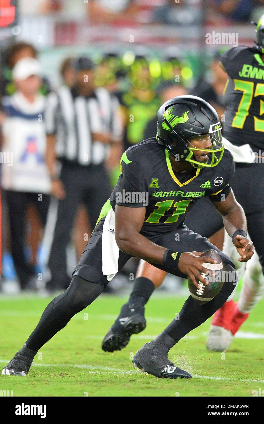USF quarterback Gerry Bohanon (11) scrambles during an NCAA football ...