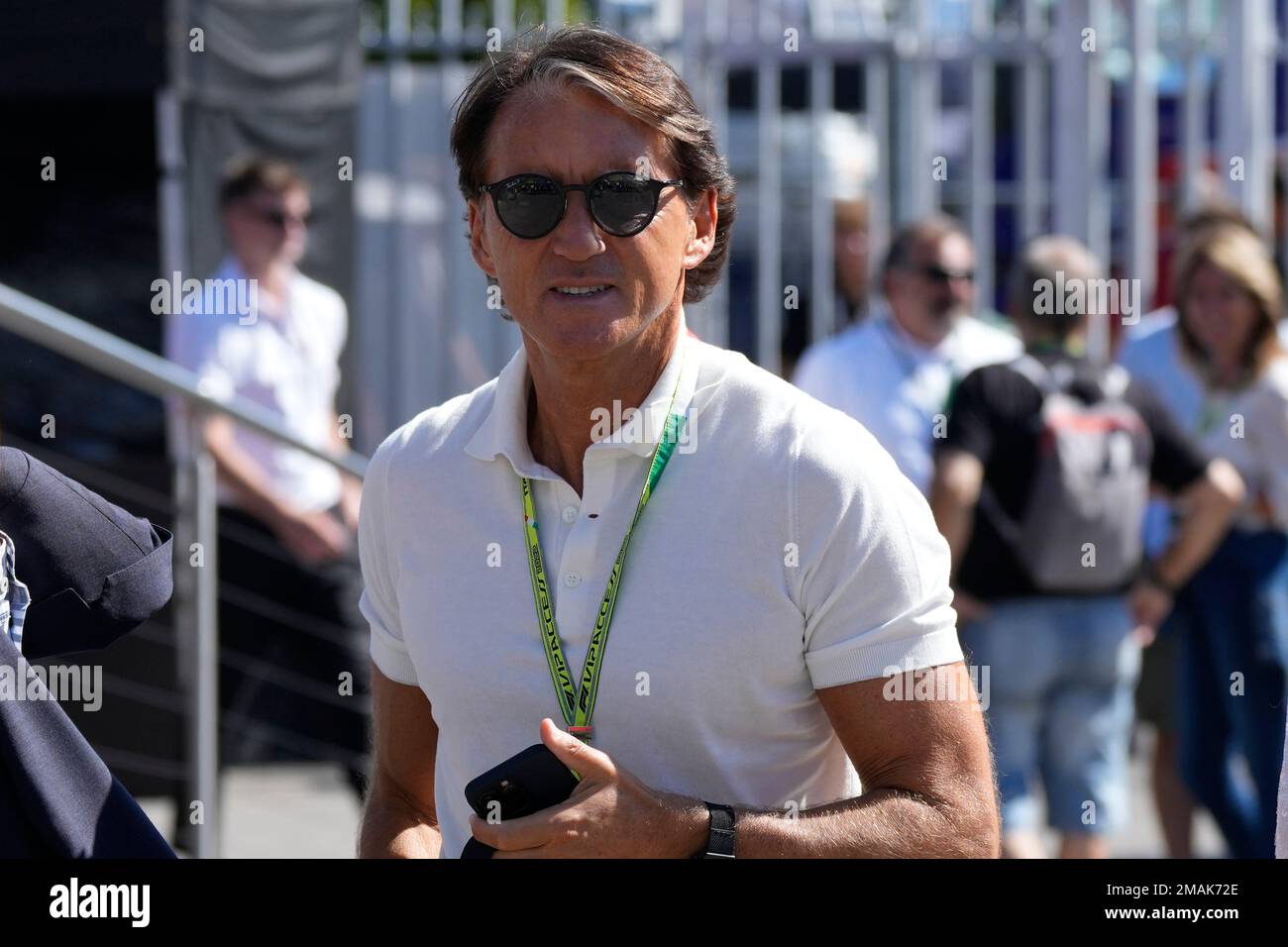 Roberto Mancini, Italian soccer team coach, walks trough the paddock ...