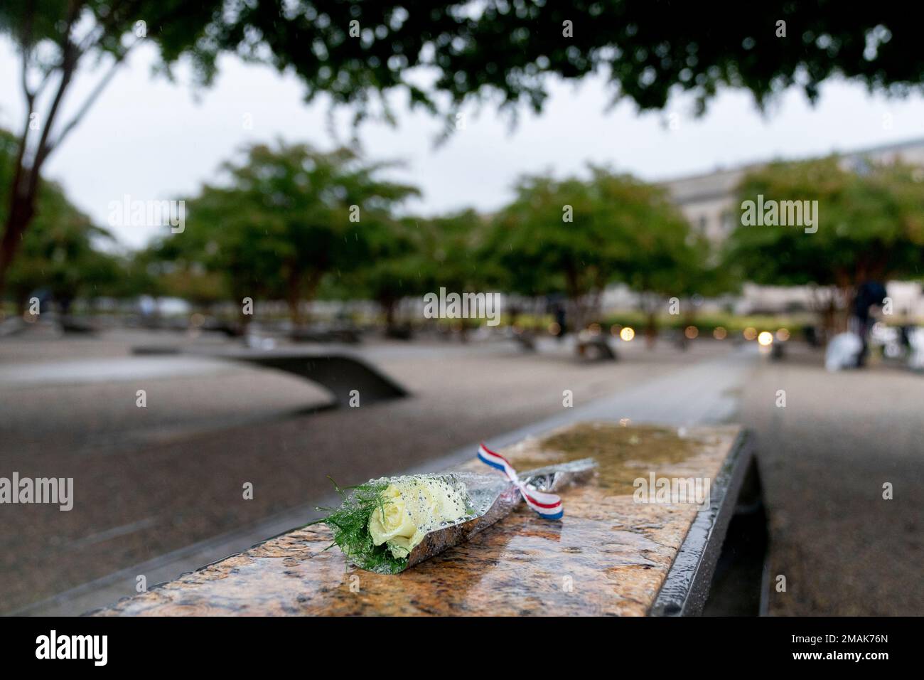 A flower is visible on one of the benches at the National 9/11 Pentagon ...