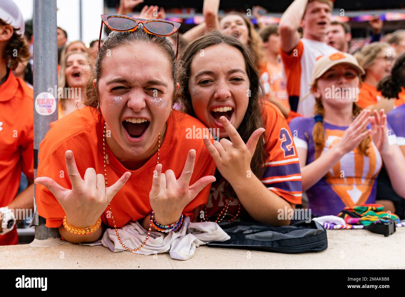 Clemson Tigers student fans cheer at the start of an NCAA college ...