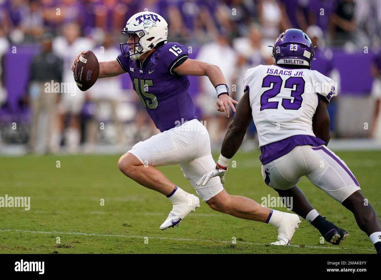 TCU quarterback Max Duggan (15) evades Tarleton State linebacker Audley ...