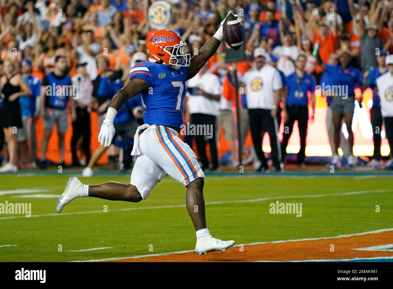 Florida running back Trevor Etienne celebrates as he crosses the goal ...