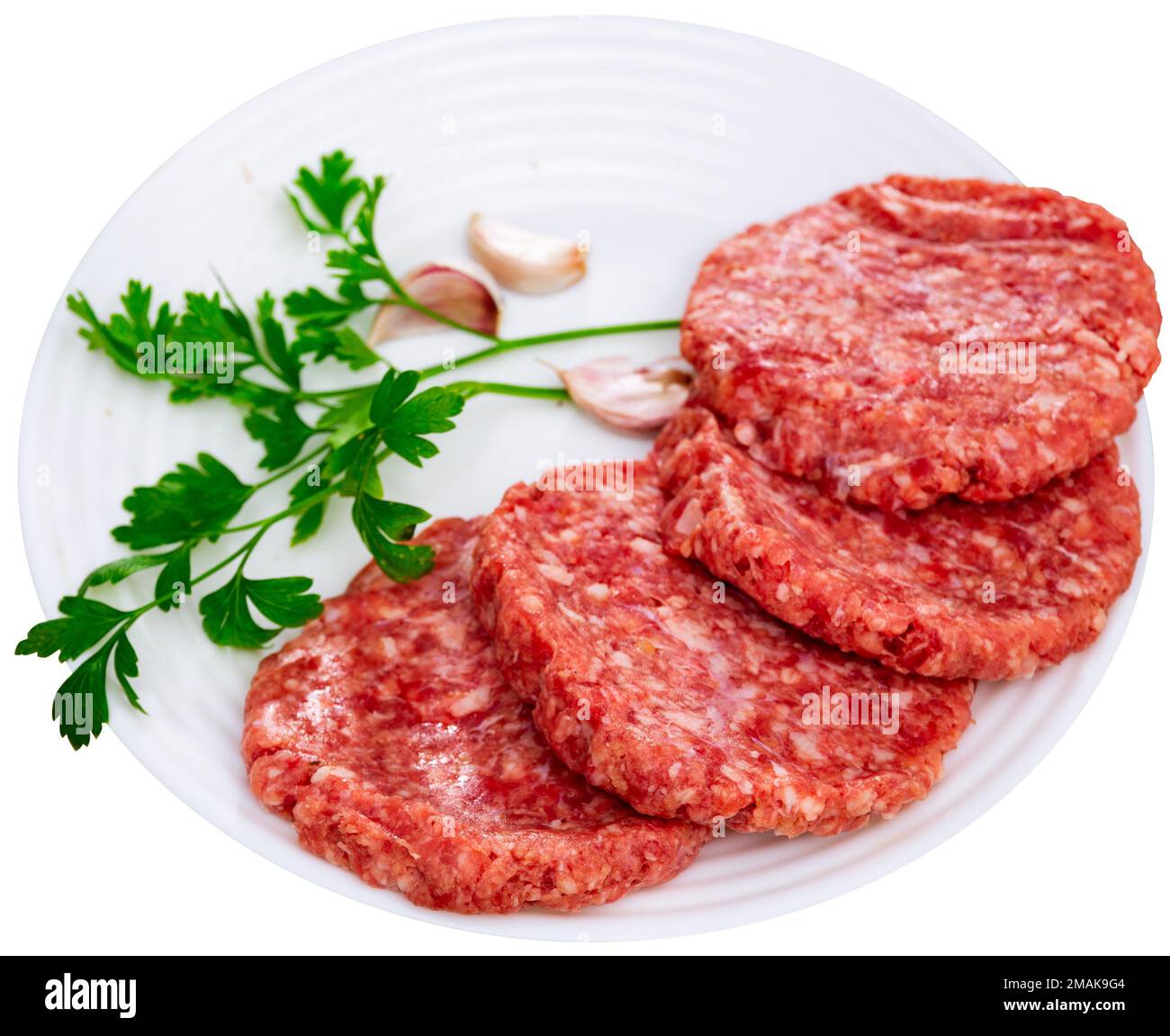 Raw beef patties for burgers with condiments on plate Stock Photo - Alamy
