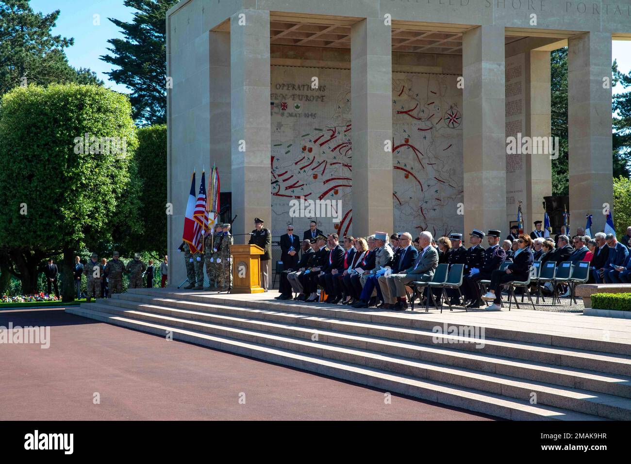 American and French representatives, civilian and military, honor the ...