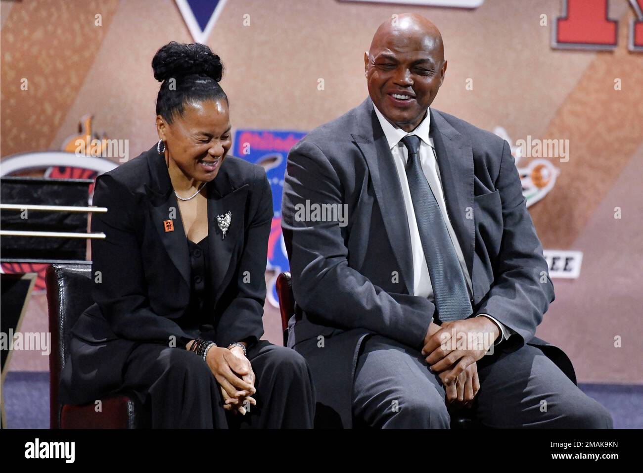 Presenters Dawn Staley and Charles Barkley laugh as they listen to ...