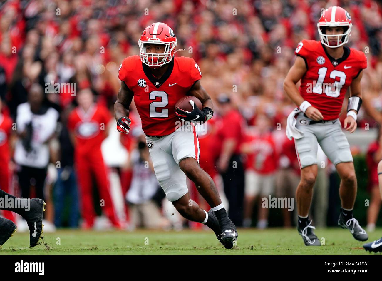 Georgia running back Kendall Milton (2) breaks into the the open field ...
