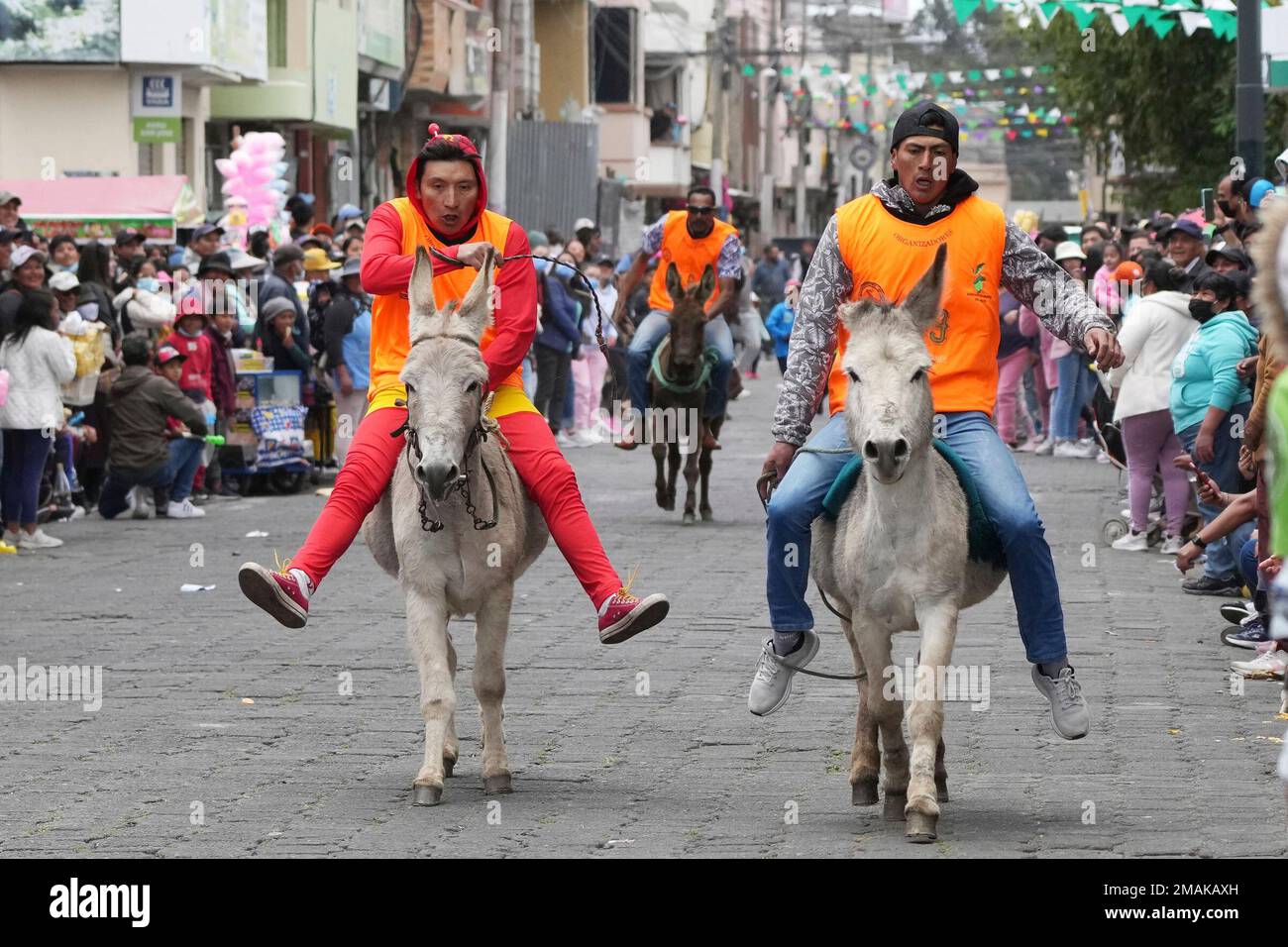 Riders race on their donkeys during the annual donkey festival in ...