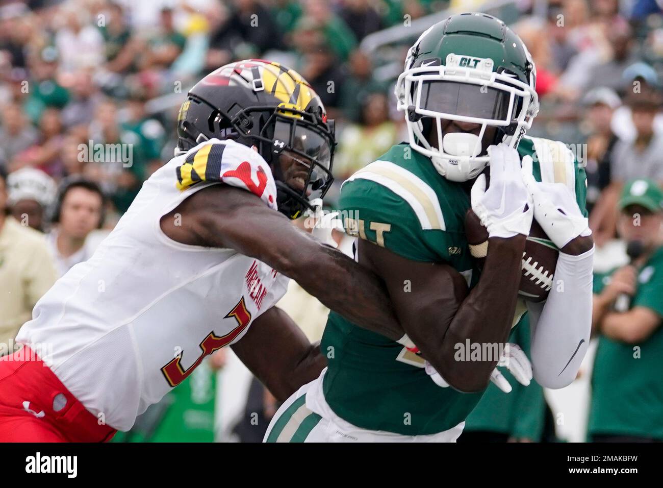 Charlotte wide receiver Grant DuBose catches a touchdown pass in front ...