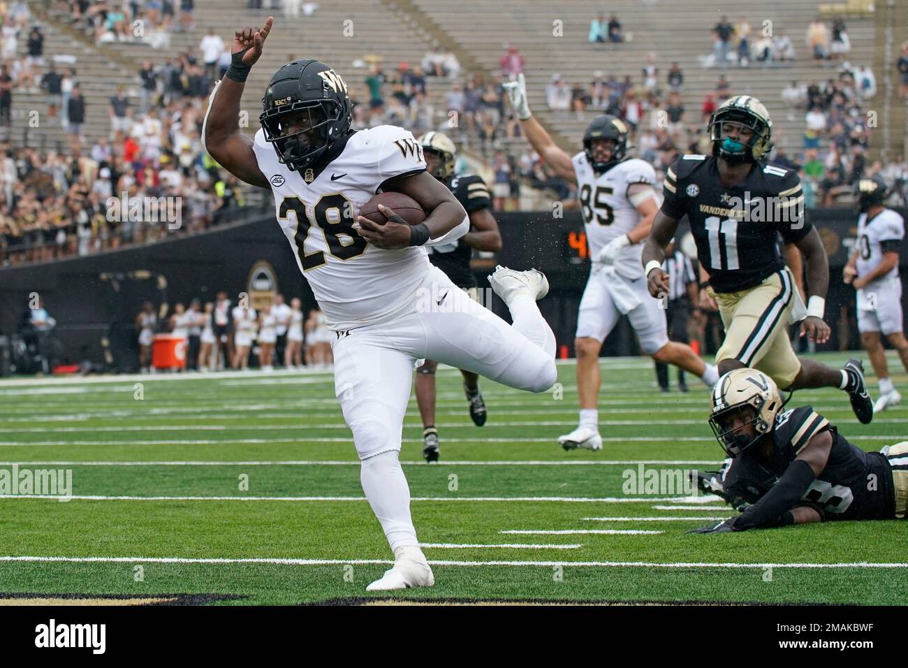 Wake Forest running back Quinton Cooley (28) scores a touchdown against ...