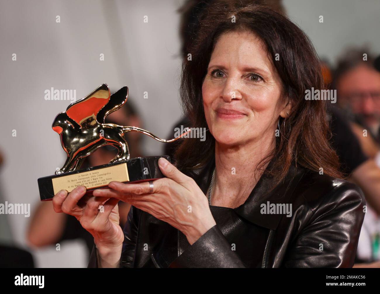 Director Laura Poitras poses with her Golden Lion Award For Best Film ...