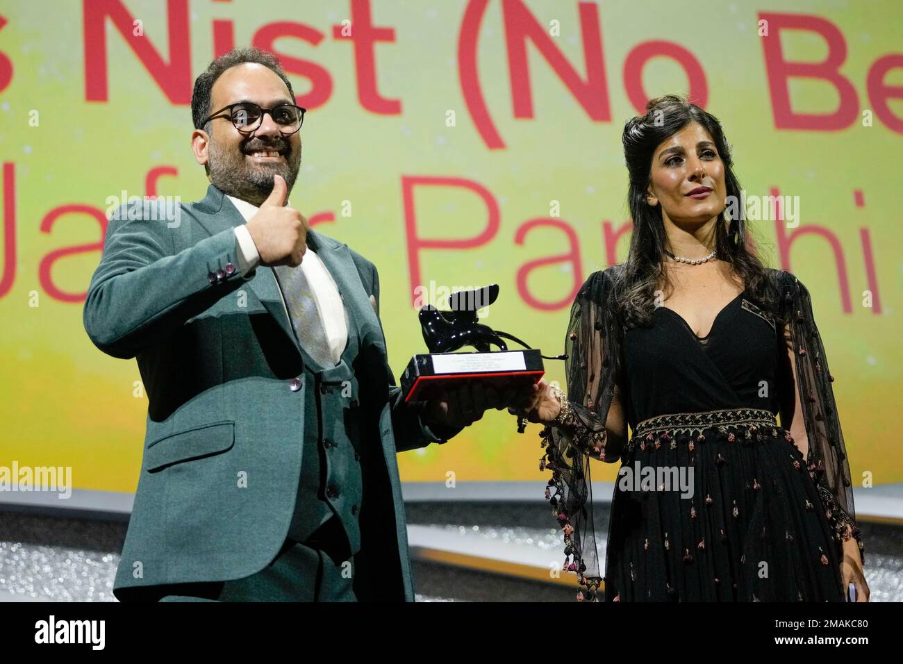 Reza Heydari, left, and Mina Khosravani, accept the Special Jury Prize on behalf of director ...