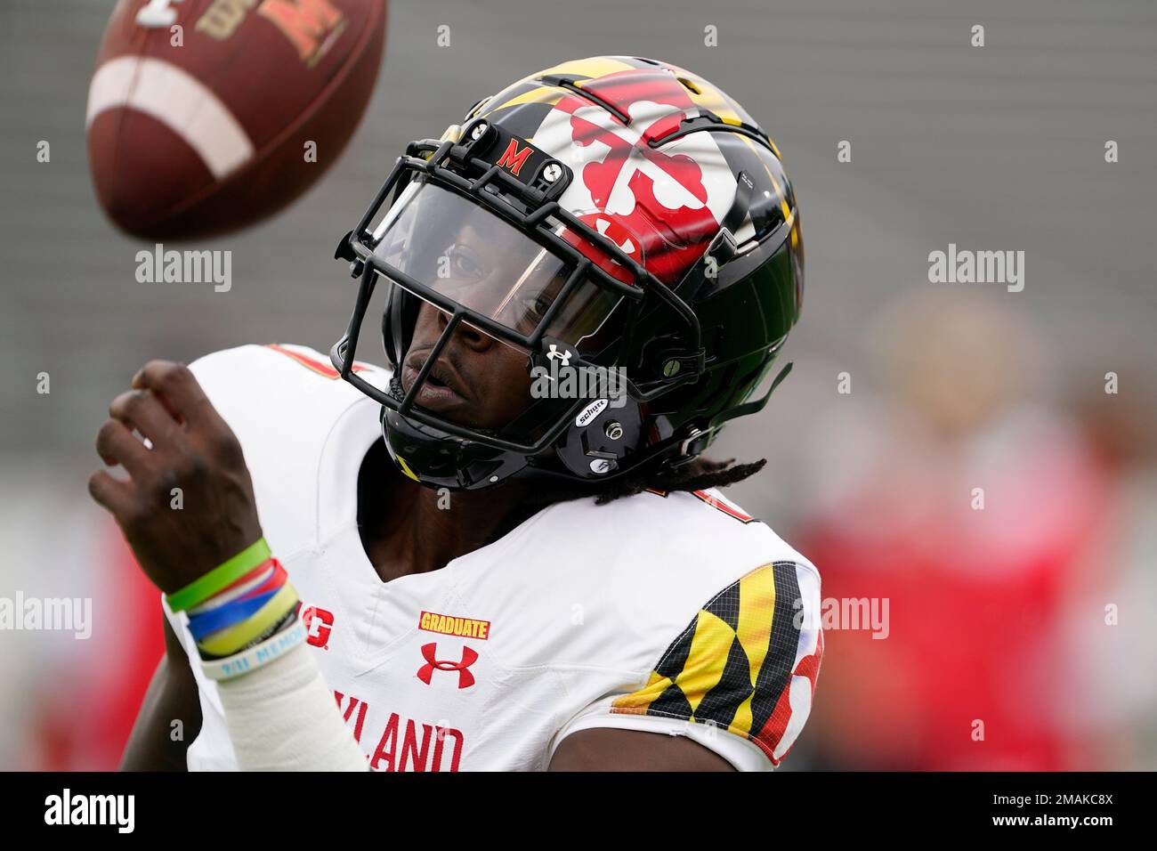 Maryland wide receiver Dontay Demus Jr. warms up before a NCAA college ...