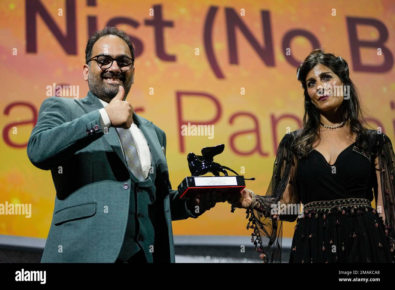 Reza Heydari, left, and Mina Khosravani, accept the Special Jury Prize on behalf of director ...