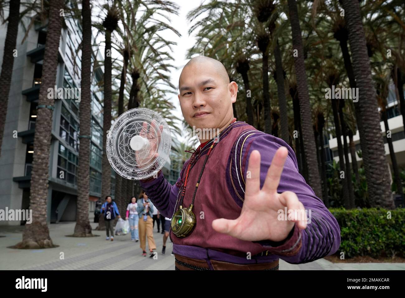 Jason Ho poses while dressed as Wong from Doctor Strange at the D23 ...