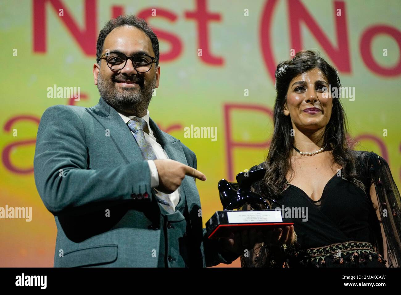 Reza Heydari, left, and Mina Khosravani, accept the Special Jury Prize on behalf of director ...