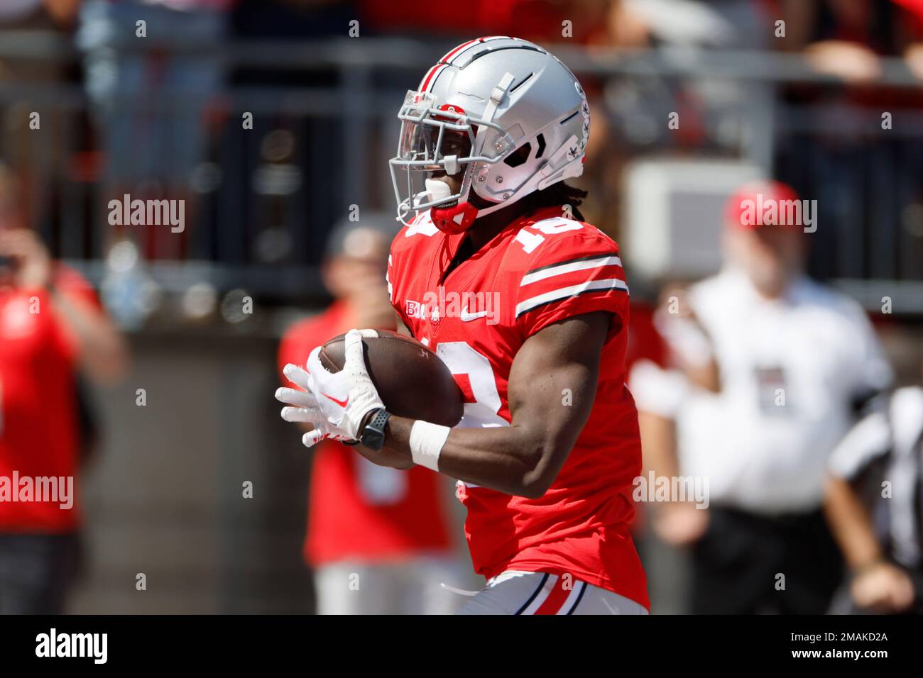 Ohio State receiver Marvin Harrison scores a touchdown against Arkansas ...